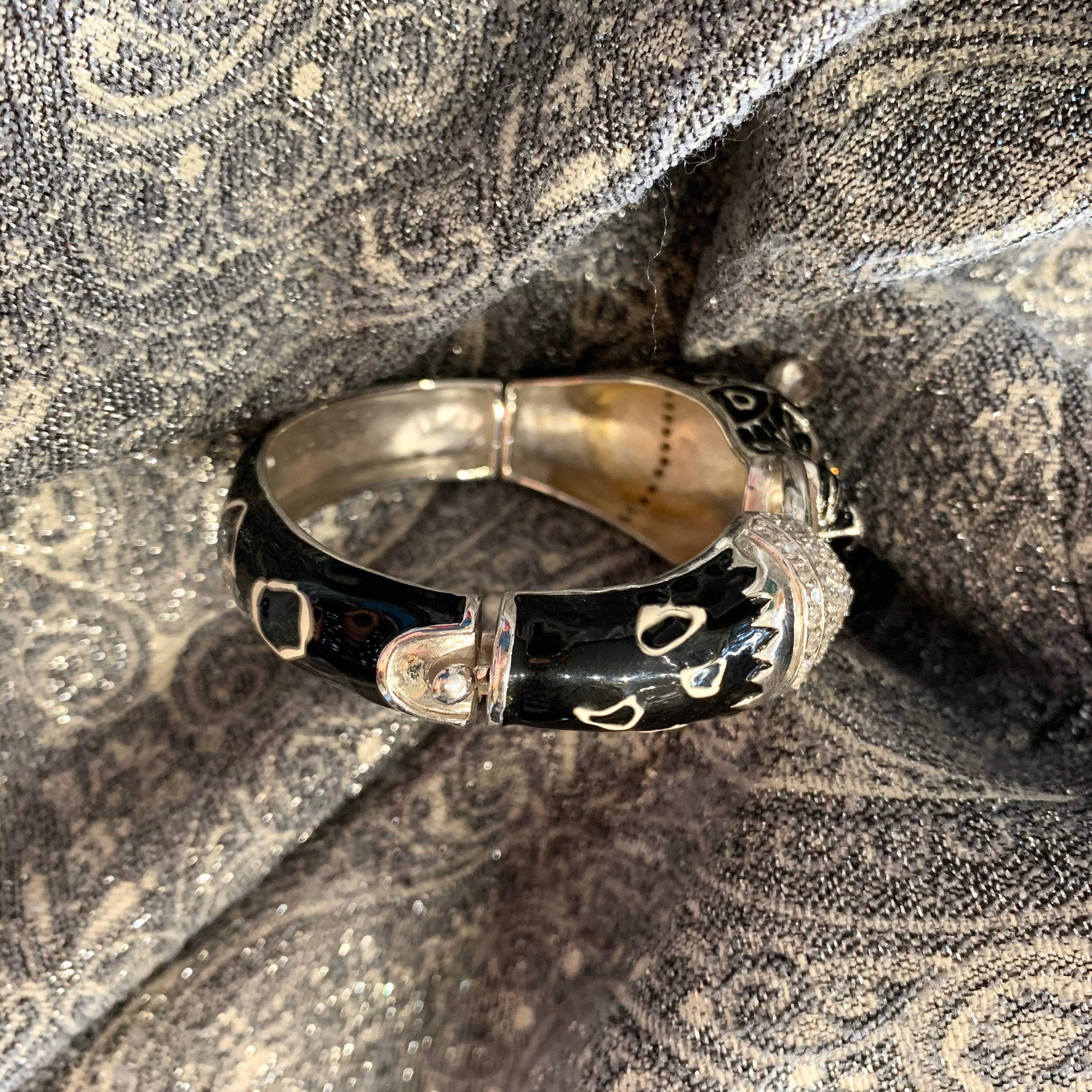 Black snow leopard cuff bracelet in silver enamel